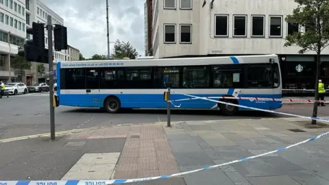 Belfast: Man in hospital after incident involving bus