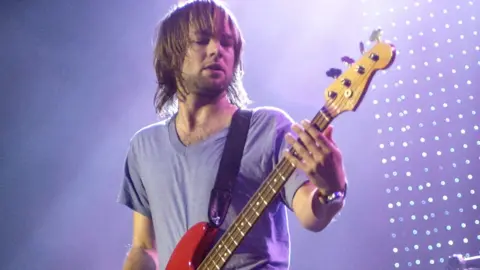 Maroon 5 bassist takes 'leave of absence' after domestic violence arrest