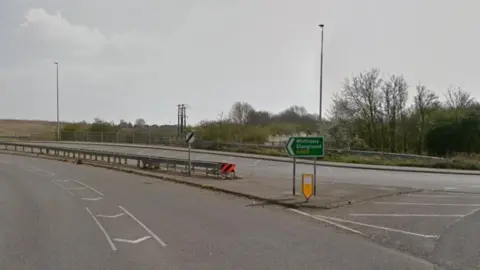 Car falls into ditch after crash in Peterborough