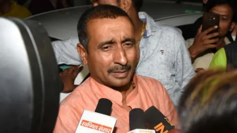 BJP MLA Kuldeep Singh Sengar, the main accused for allegedly raping a 17-year-old Dalit girl in Uttar Pradesh's Unnao, speaks to media personnel outside SSP office, on April 11, 2018 in Lucknow, India.