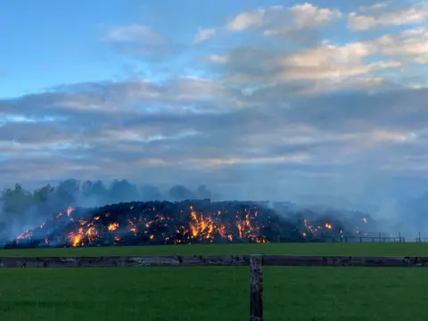 Haughley fire: Images show large blaze turning night sky orange