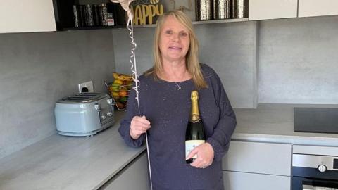 Shoreham man charged with murder after woman dies in house - BBC News