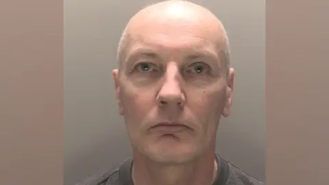 Killer doctor Michael McGrane jailed for raping a child