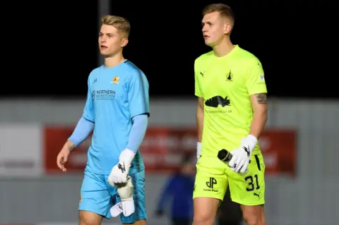 Goalkeeping brothers bring family rivalry to pitch