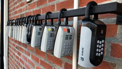 Emergency rent freeze laws passed in Scotland - BBC News