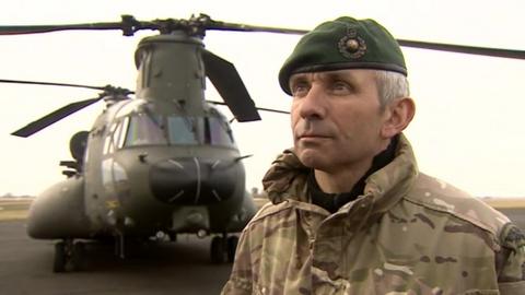 RAF Chinook takes supplies to cut-off Cumbrian communities - BBC News