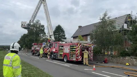 Firefighters tackle Whittington house blaze