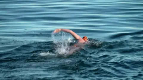 Cornwall teenager completes cross-Channel swim in 15 hours