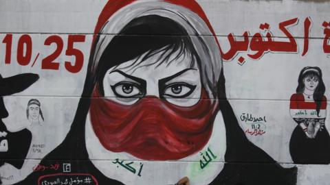 Iraq protests: The women rising up on Baghdad's walls - BBC News