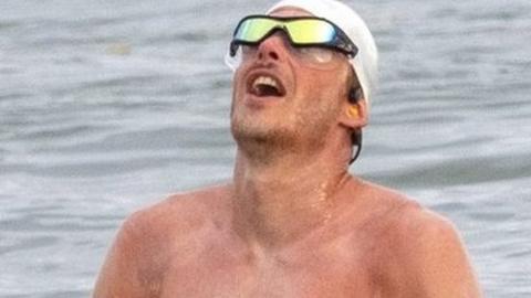 Storm holds up eco campaigner's Greek island charity swim - BBC News