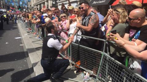 Thousands join Pride parade in London - BBC News