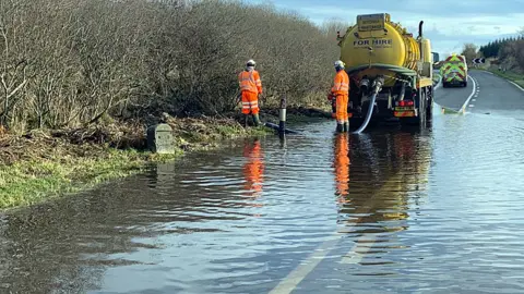 Flooding affects railway in Highlands and A75 in South
