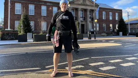 Padiham man braves cold snap in barefoot charity challenge