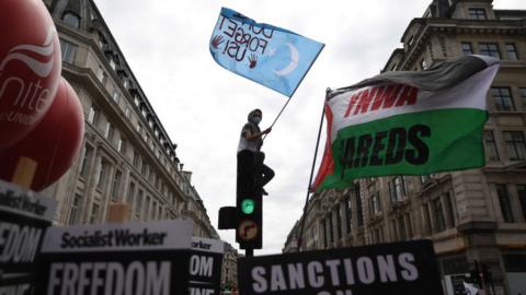 London protests: Thousands march through capital in day of protest ...