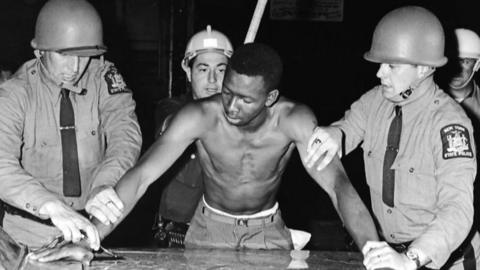 George Floyd death: How US police are trying to win back trust - BBC News