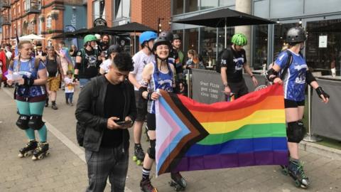 Suffolk Pride returns with parade through Ipswich - BBC News