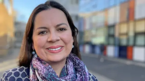 Cost of living: Swansea mum says hub helps keep baby warm