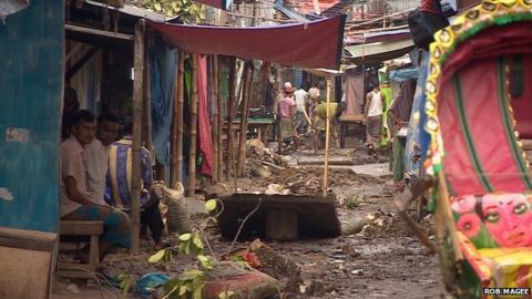 The Dhaka slum being transformed by women - BBC News