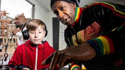 Photo exhibition showcases the people tackling poverty - BBC News