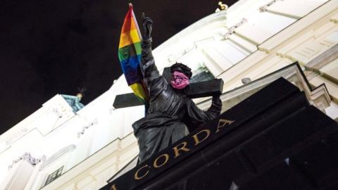 Poland LGBT protests: Three charged with hanging rainbow flags off ...