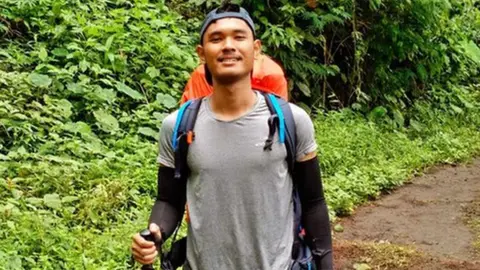 Indonesian woman's body found inside python, say reports