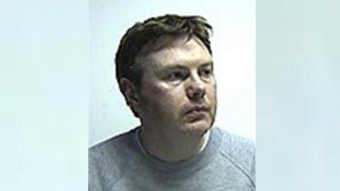 Member of notorious paedophile network has jail term cut - BBC News