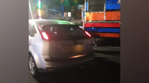 Woman badly hurt after car drives into Wigan funfair