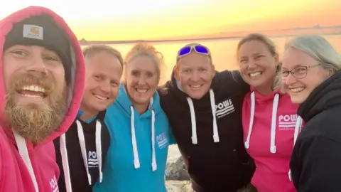 Swimmers smash Cornwall to Scilly relay time