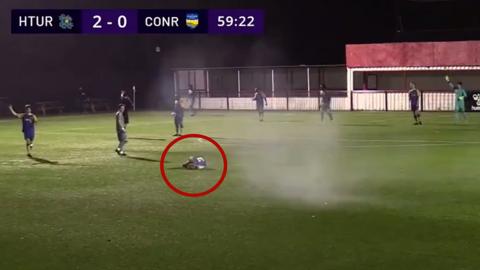 Football match abandoned after firework nearly hits player - BBC News