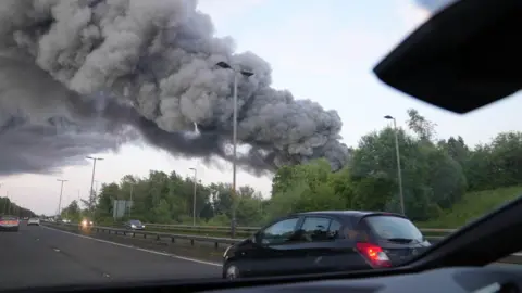 'Loud explosions' as firefighters tackle industrial blaze