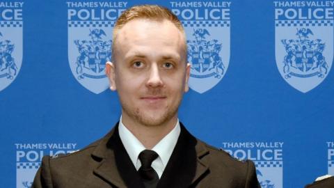 Police officers ambushed by armed man awarded for bravery - BBC News