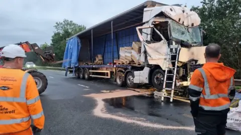 Three lorry crash causes diesel and oil spillage on M6 near Stafford
