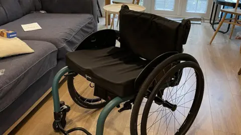 Plea over wheelchair taken from Birmingham garden