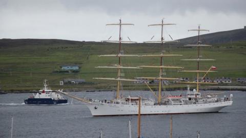 Tall ships make a splash as they sail into Shetland - BBC News