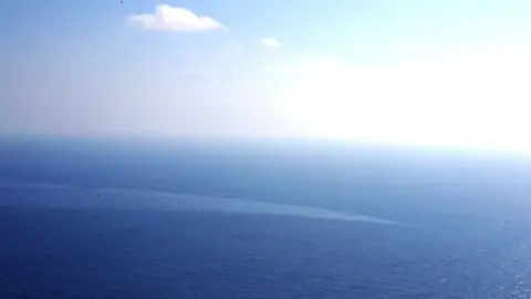 Sunken tanker Sanchi: Four oil slicks seen, says China