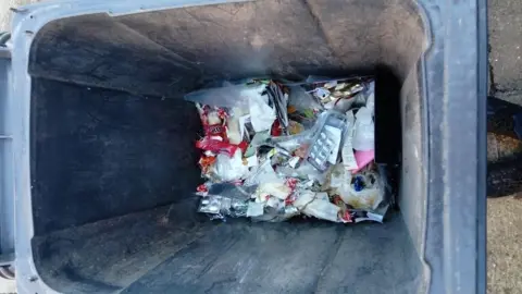 Dad and son's Rushden recycling push gives bin crews break
