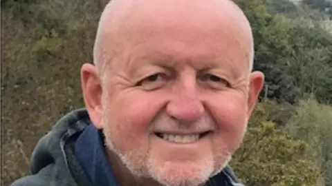 Gareth Jones: Body found in search for man lost at sea with dog