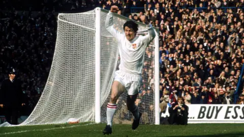 FootballerJohn Ritchie's statue relocated to new location at stadium