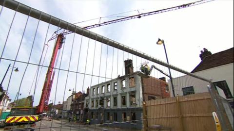 Midhurst fire: Work under way to shore up buildings gutted by fire ...