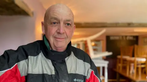 Emotional landlord assesses flood damage to Ringwood pub