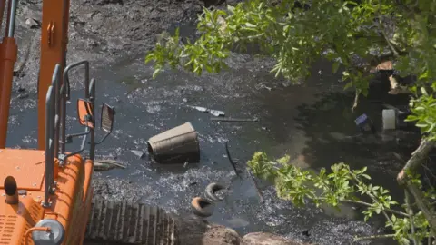 Renee and Andrew MacRae: Flooded quarry drained