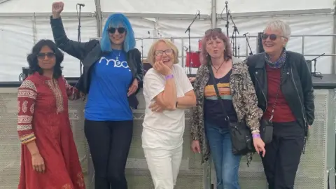 Tributes to Leicester 'punk mum' who inspired women to play in bands
