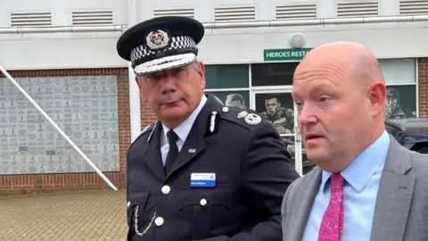 Medal allegedly worn by police chief Nick Adderley was a copy, panel told