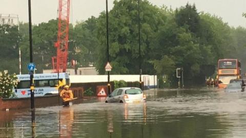 Flash-flooding brings parts of London and Kent to standstill - BBC News