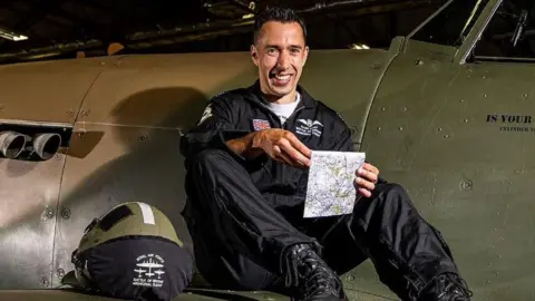 'Poignant' funeral and flypast for Spitfire crash pilot Mark Long