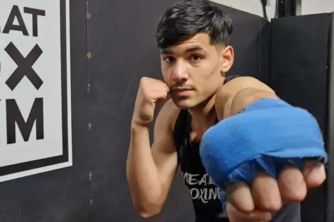 Teen Afghan refugee becomes boxing champion in two years