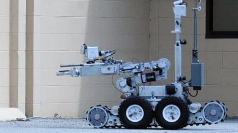 Robot runs over toddler in shopping centre - BBC News