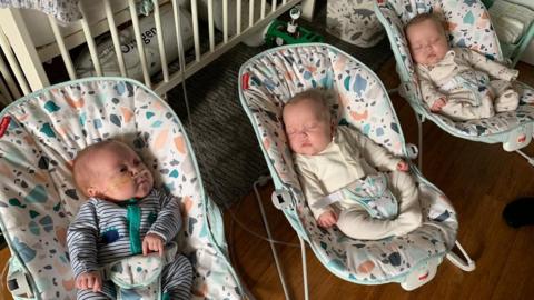 Rare identical Cheshire triplets were 'one-in-200 million' - BBC News