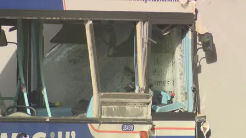 Five taken to hospital after bus crashes into Paisley flats