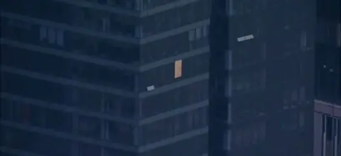 Mystery gunman targets New York luxury high-rise